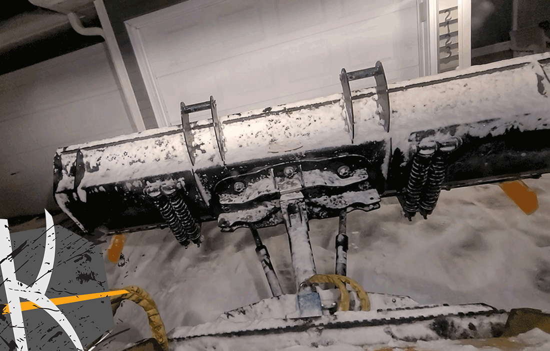 Back Dragging Driveways with a Skid Steer Snow Pusher